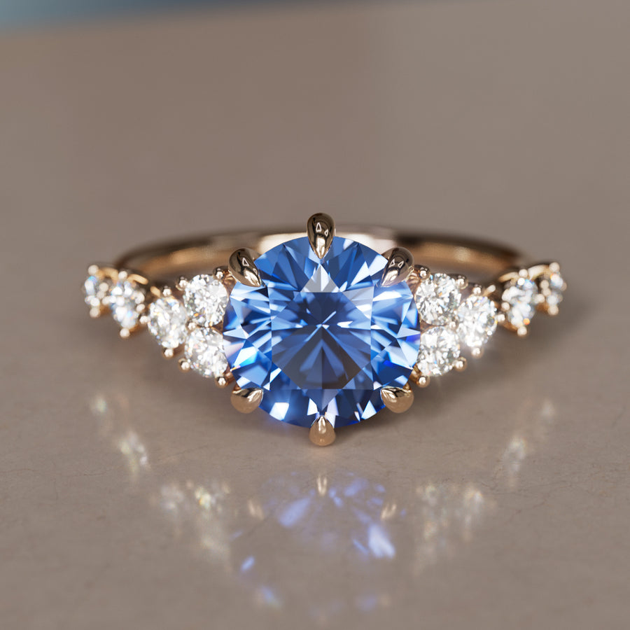Anello di fidanzamento celestiale con zaffiro blu rotondo e diamanti ...